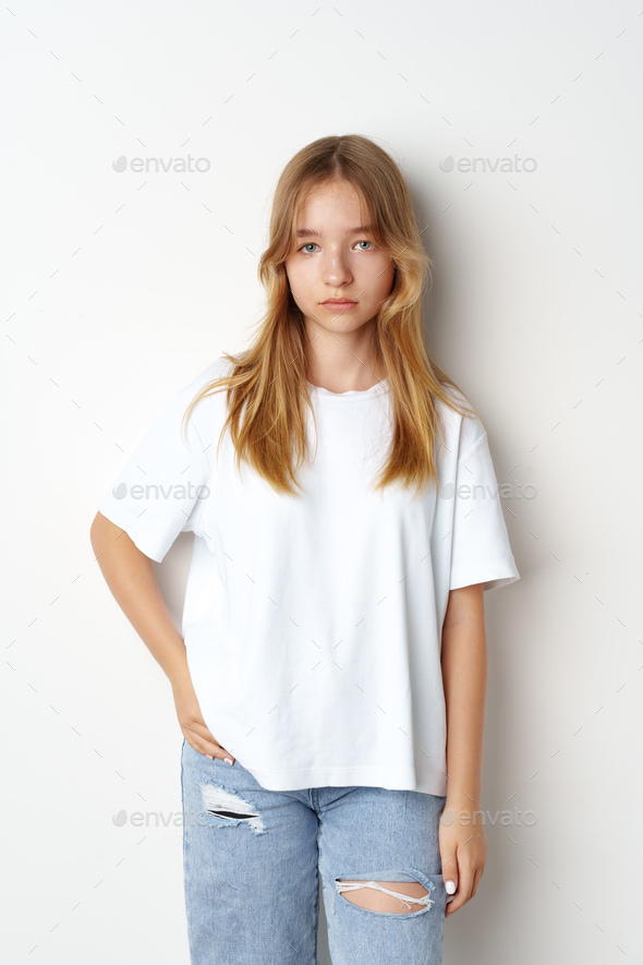 Portrait of young beautiful cute teen girl posing at camera Stock Photo ...