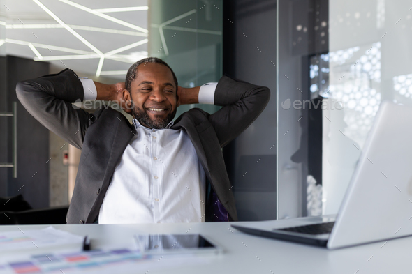 Well done businessman successfully completed the work, rests in the ...