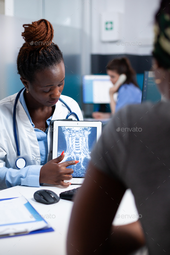 Radiology doctor with x-ray scan Stock Photo by DC_Studio | PhotoDune
