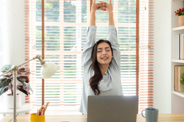 Business Woman relieves her stress after finishing her work Stock Photo ...