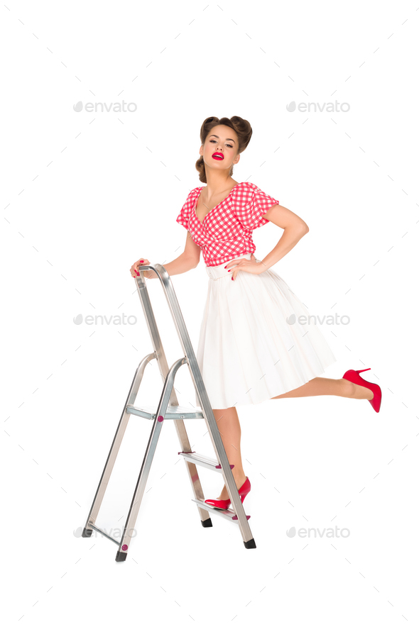 pin up woman standing on ladder isolated on white Stock Photo by ...