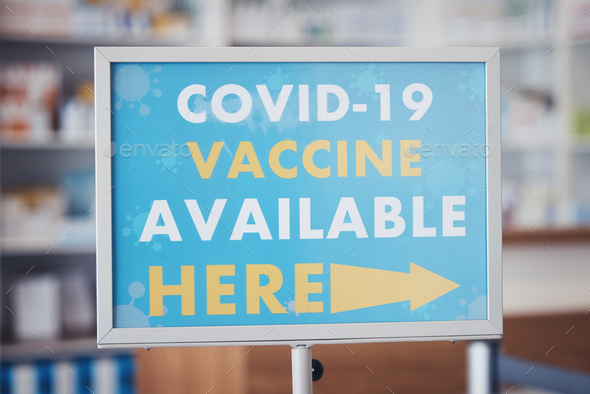 Covid 19 vaccine sign, arrow pointing and pharmacy announcement for ...