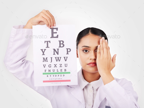 Portrait, poster and eye test with a woman optician in studio on a ...