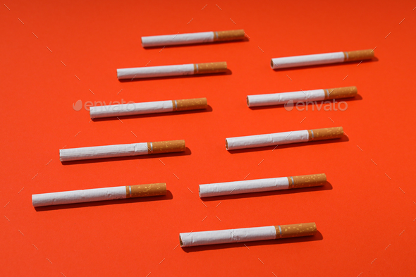 The concept of addiction to smoking, outlined whole cigarettes. Stock ...