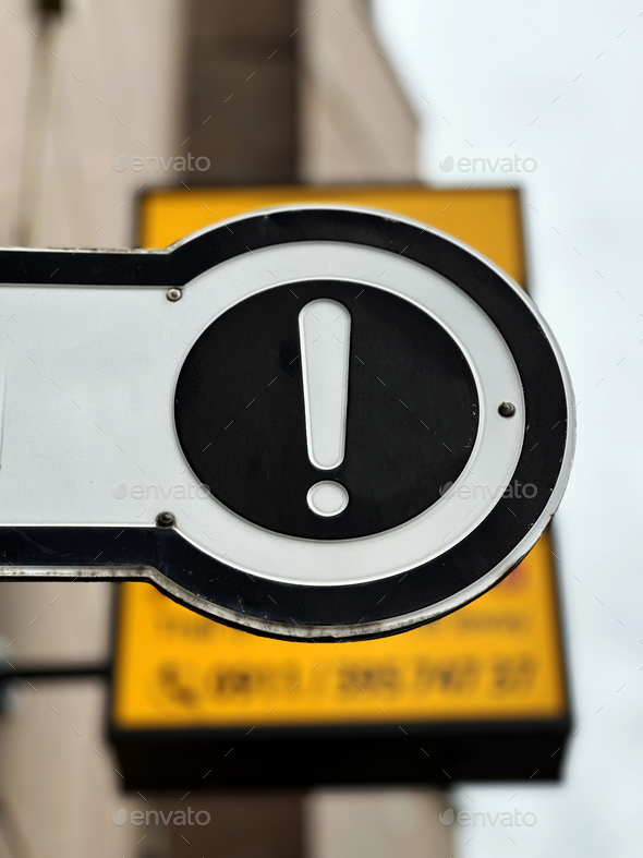Round Warning Sign "Exclamation Mark" On Yellow Background In The City ...