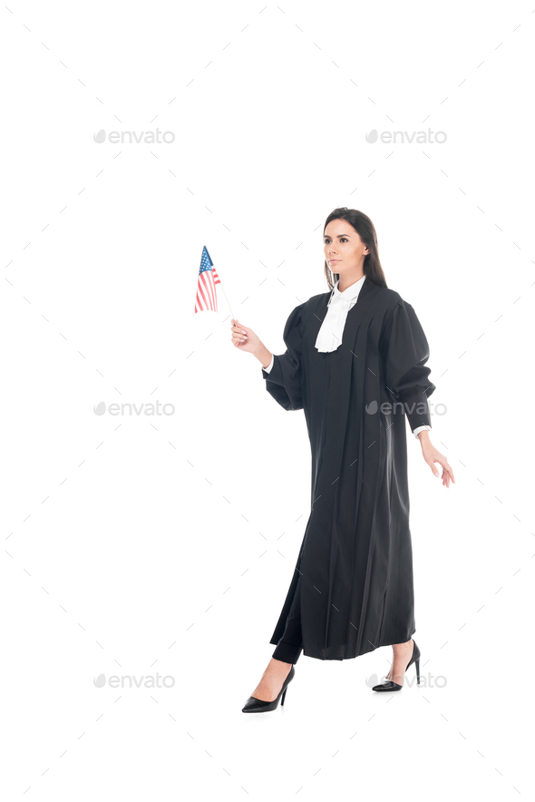 Judge in judicial robe holding american flag and walking isolated on ...