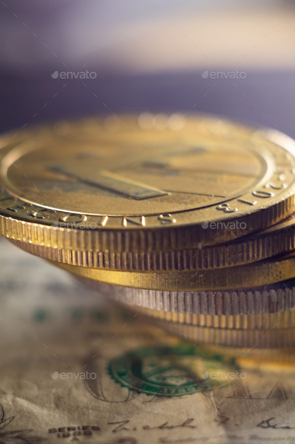 Vertical shot of golden coins Stock Photo by wirestock | PhotoDune