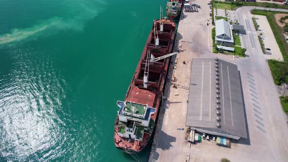 Aerial top view of cargo ship carrying container.Container ship loading ...