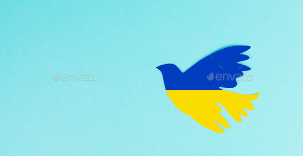 Dove in the colors of the ukrainian flag, symbol for peace and hope ...
