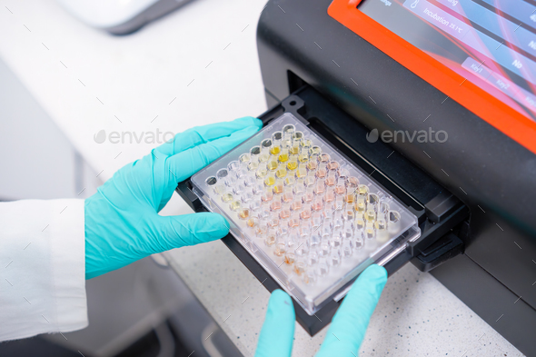 A microplate spectrophotometer is used by scientist to analyze DNA ...