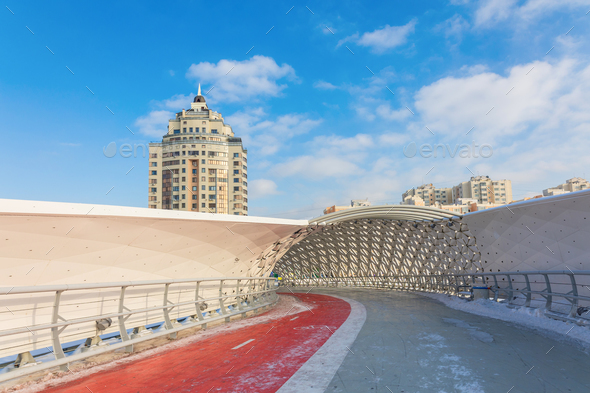 Modern architectural urbanistic Atyrau fish bridge across Ishim river ...