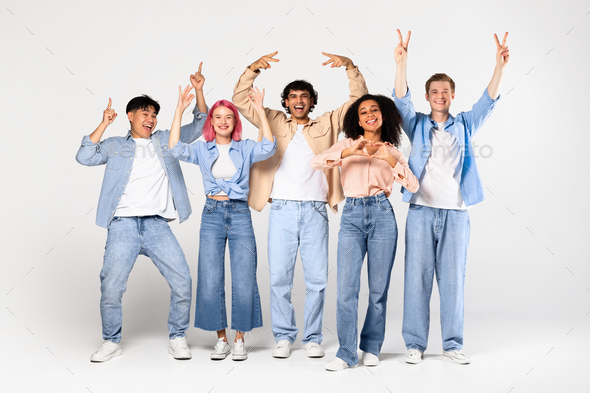 Happy diverse friends showing various non verbal body language hand ...