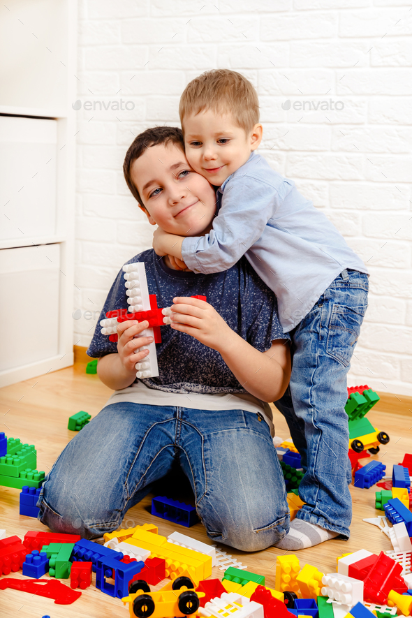 The brothers embrace. Boys value each other's friendship Stock Photo by ...