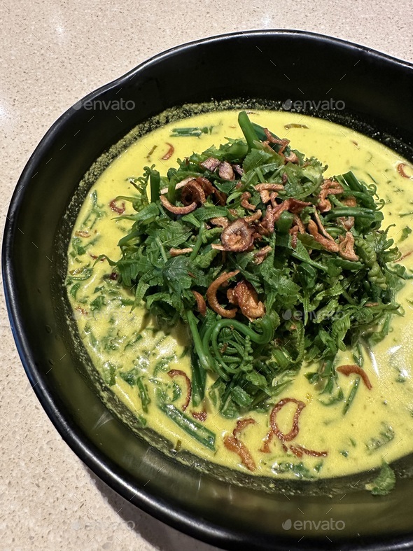 Jungle fern cooked in coconut milk, malaysia cuisine Stock Photo by ...