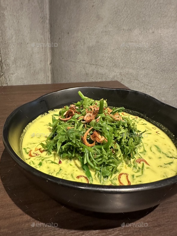 Jungle fern cooked in coconut milk, malaysia cuisine Stock Photo by ...