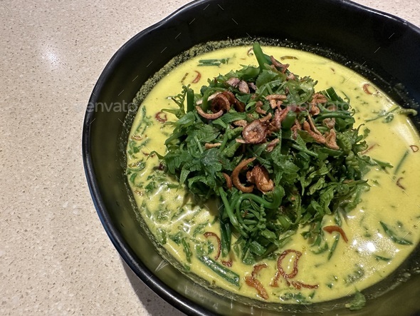 Jungle fern cooked in coconut milk, malaysia cuisine Stock Photo by ...