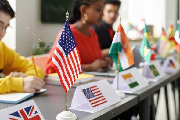 Multiracial students studying at school Stock Photo by Media_photos