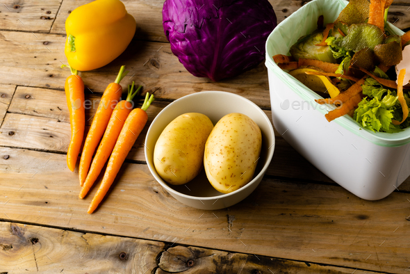 Raw vegetables and vegetable waste in kitchen composting bin Stock ...