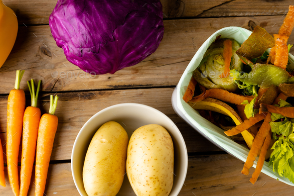 Overhead of raw vegetables and vegetable waste in kitchen composting ...