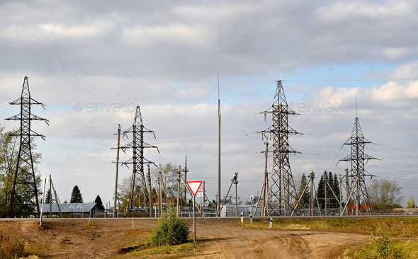 View of power lines near residential buildings. Electricity. Stock ...