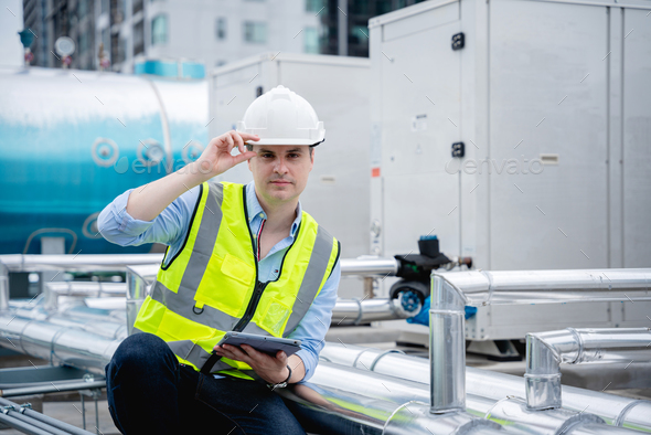 Engineers is checking the air conditioning cooling system of a major ...