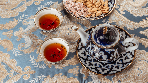 traditional uzbek tea with nuts Stock Photo by ksuterochkina | PhotoDune