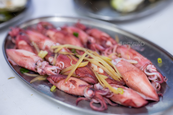 Steamed squid dish in street market of Taiwan Stock Photo by leungchopan