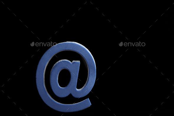 blue at symbol on black background Stock Photo by wirestock | PhotoDune