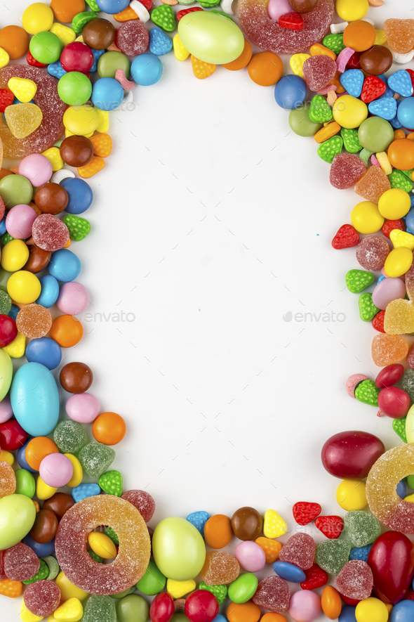 Colorful lollipops and different colored round candy. Top view. Stock ...