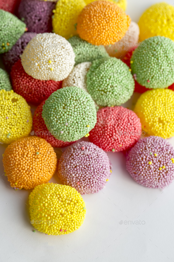 Colorful lollipops and different colored round candy. Top view. Stock ...