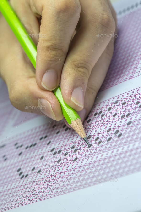 Exams quiz test paper with pencil drawing selected choice on answer ...
