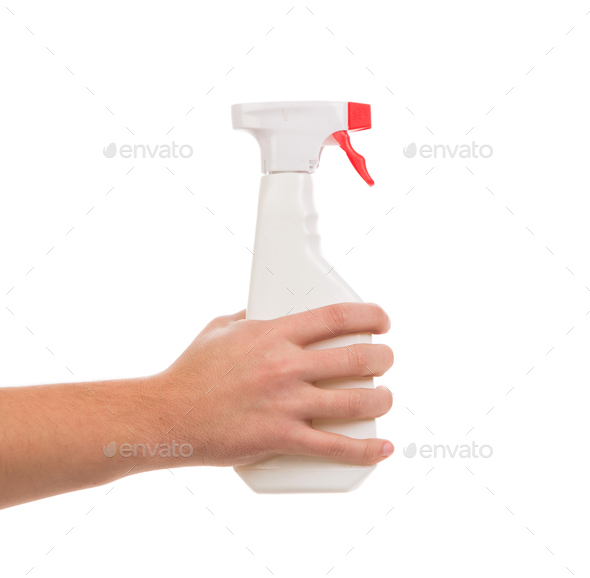 Hand holding spray bottle. Stock Photo by indigolotos | PhotoDune