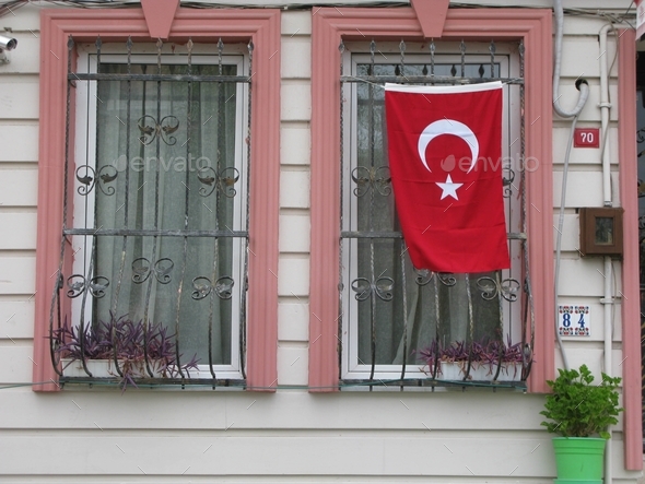Building facade with a window with hanging Turkey flag Stock Photo by ...