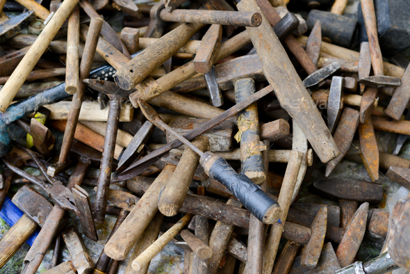 Top view of the pile of different types of wooden tools on each other ...