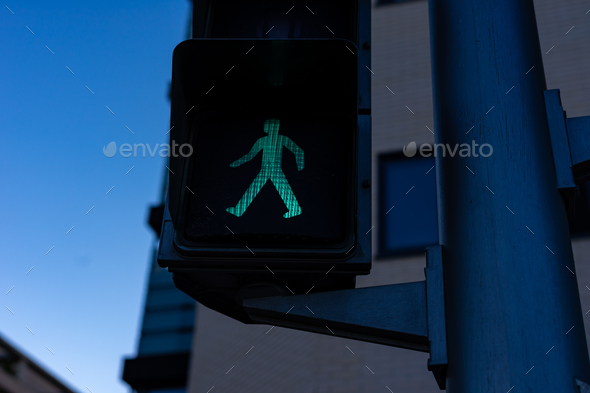 Low angle shot of green traffic light on the street at daytime Stock ...