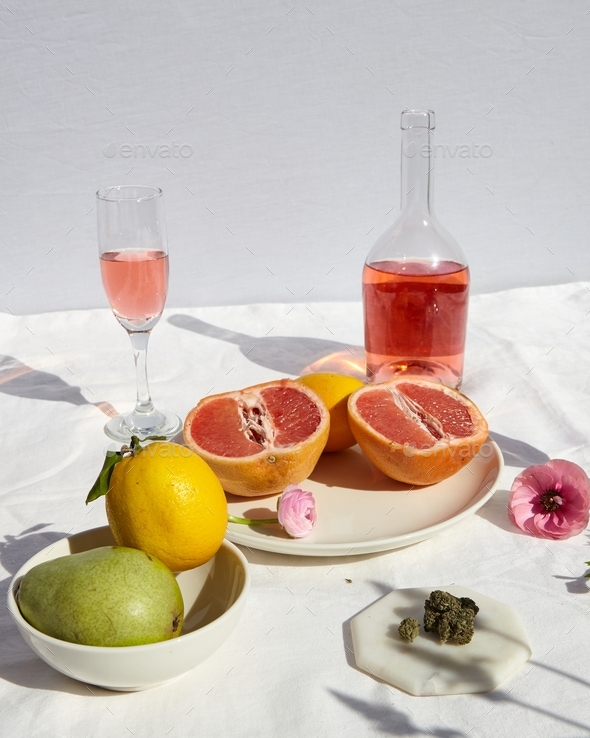 THC CBD Marijuana Flower with Fruit and Rose' on Table Stock Photo by ...