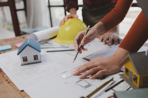 Group architects and engineers build houses and conference buildings ...