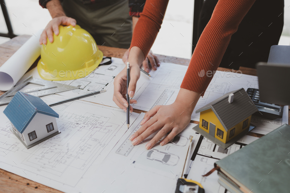 Group architects and engineers build houses and conference buildings ...