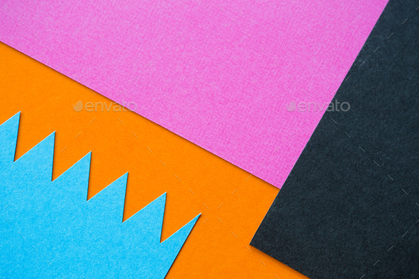 colored cardboard of different shapes. bright abstraction made of paper ...