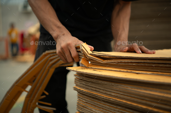 Warehouse staff working of paper products, Paper storage foreground and ...