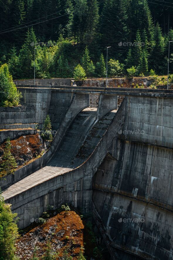 Safety evacuation of the water level of a concrete dam Stock Photo by ...