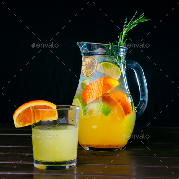 Photo of red lemonade with fruits Stock Photo by wirestock | PhotoDune