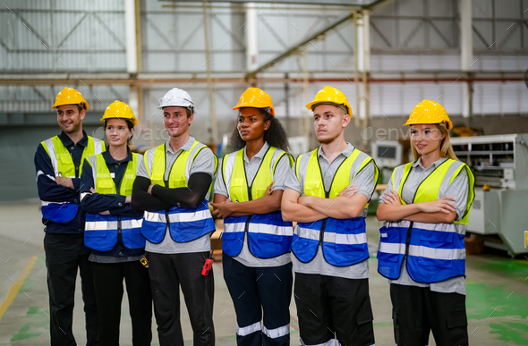 Group of smiling worker standing together at logistic distribution ...