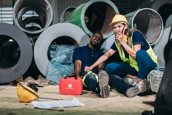 Engineers have an accident while working in metal sheet at industry ...