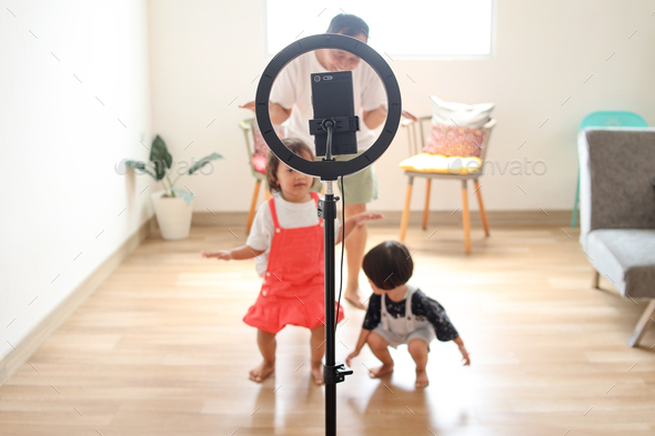 children doing tiktok dance challenge Stock Photo by Garakta-Studio