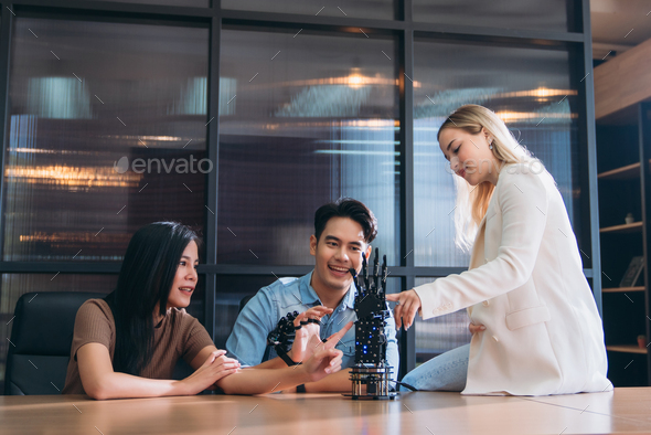 College Students research inventions robotics and robot arm ...