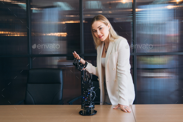 College Students research inventions robotics and robot arm ...