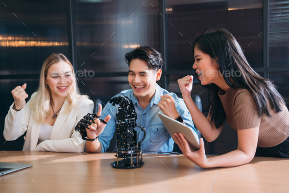 College Students research inventions robotics and robot arm ...