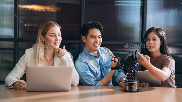 College Young students research inventions robotics and robot arm ...