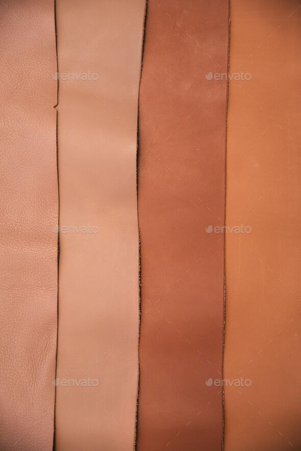 Array of leather fabric samples in different shades neatly placed on a ...